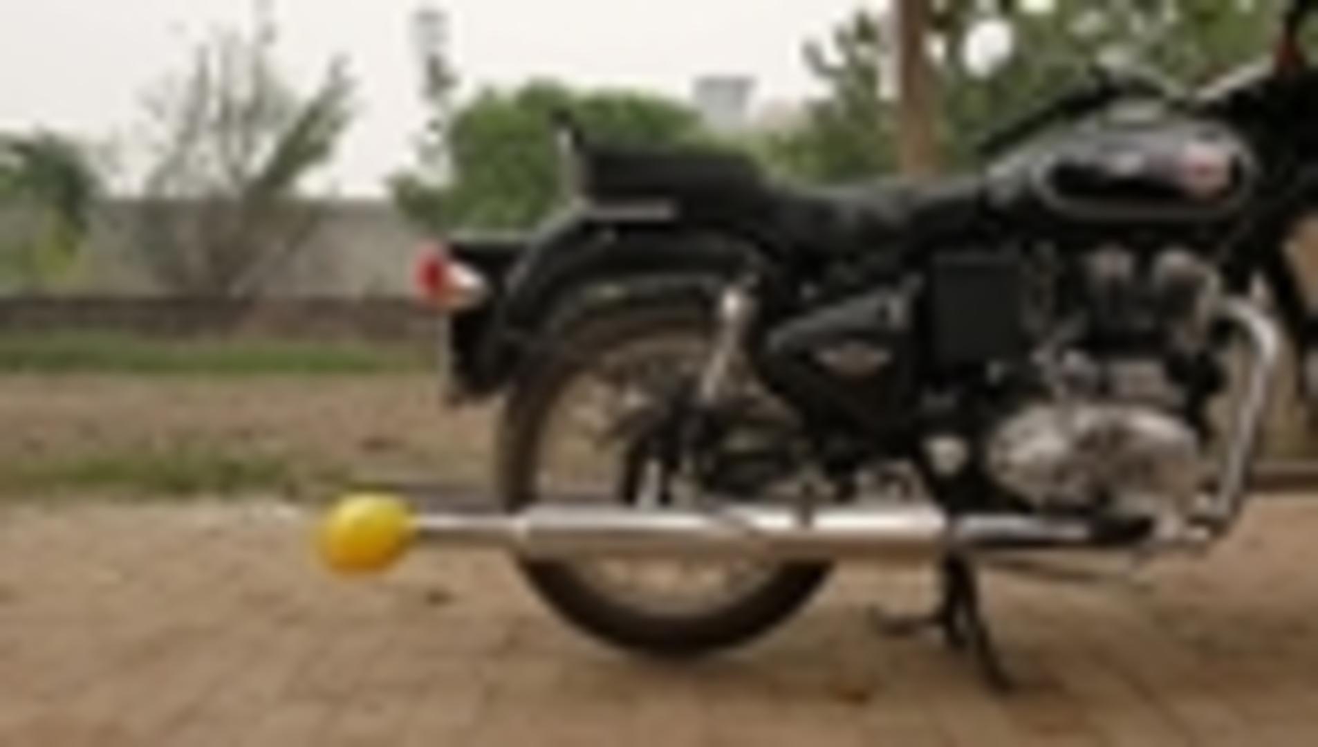 Balloon Explodes on Motorcycle Exhaust Pipe
