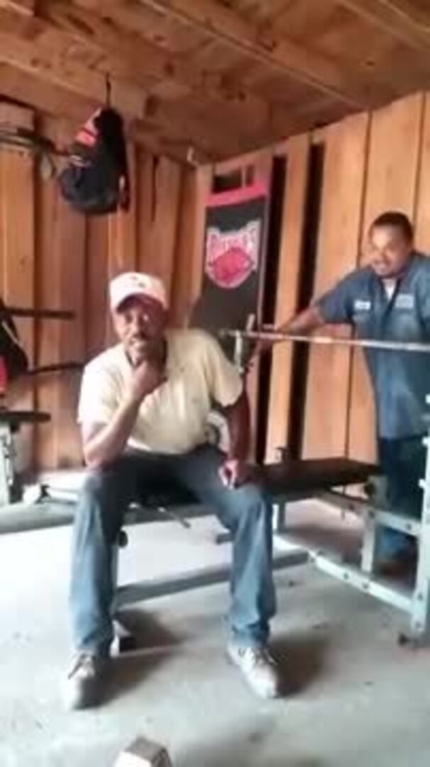 Heavy Barbell Drops on Man's Neck