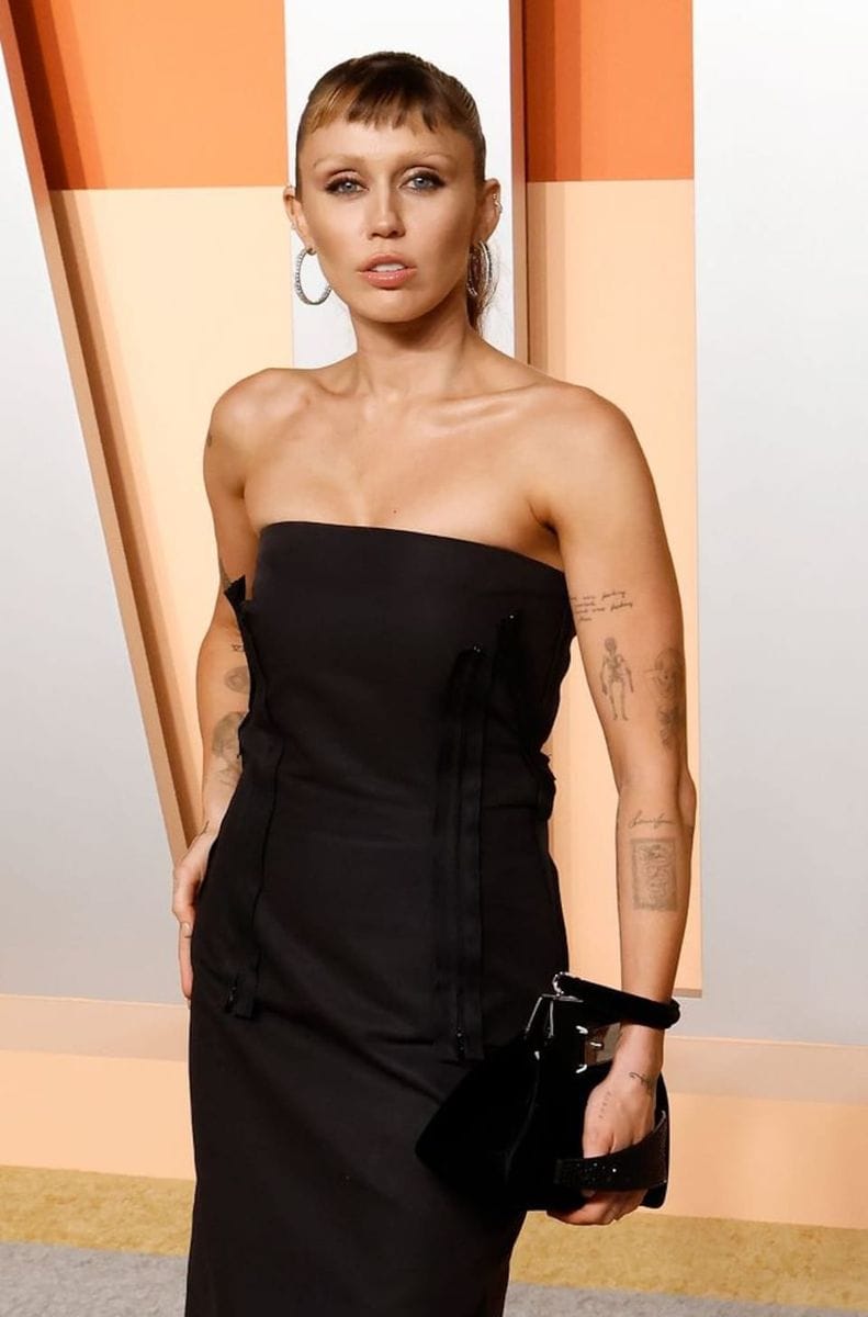 Miley Cyrus' retro micro bangs are the look of summer