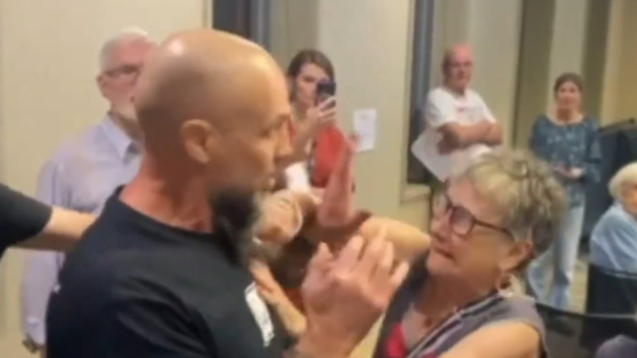 Screams, punch thrown as far-right agitators disrupt candidates' forum
