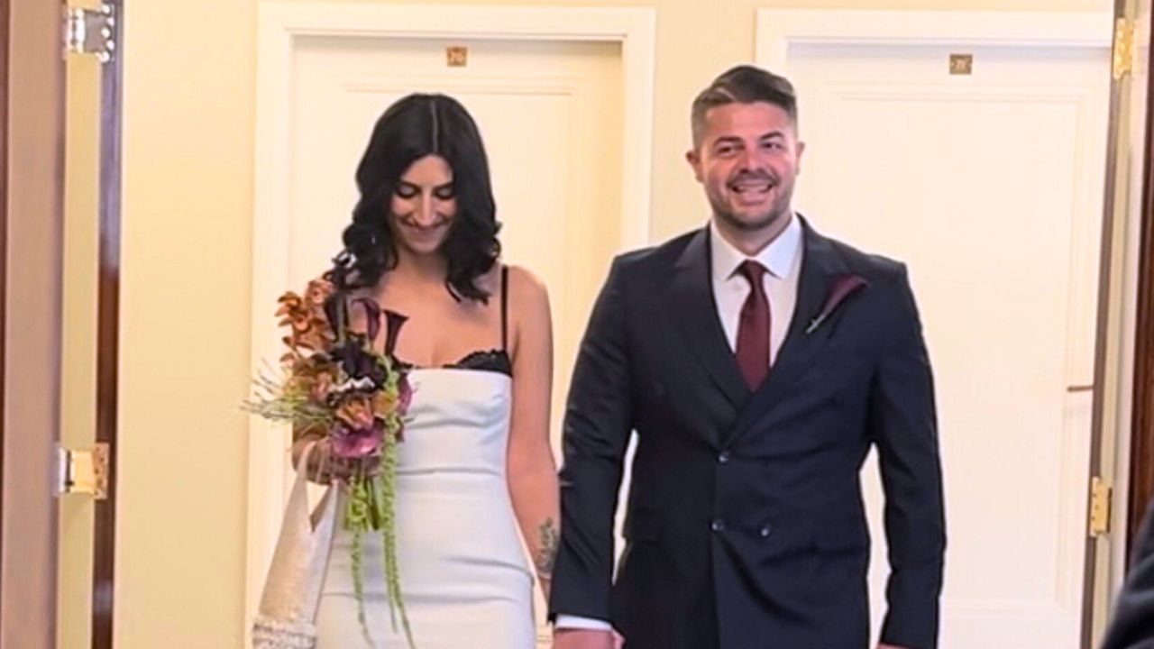 Bride 'bullied' after wearing black bra with white wedding dress