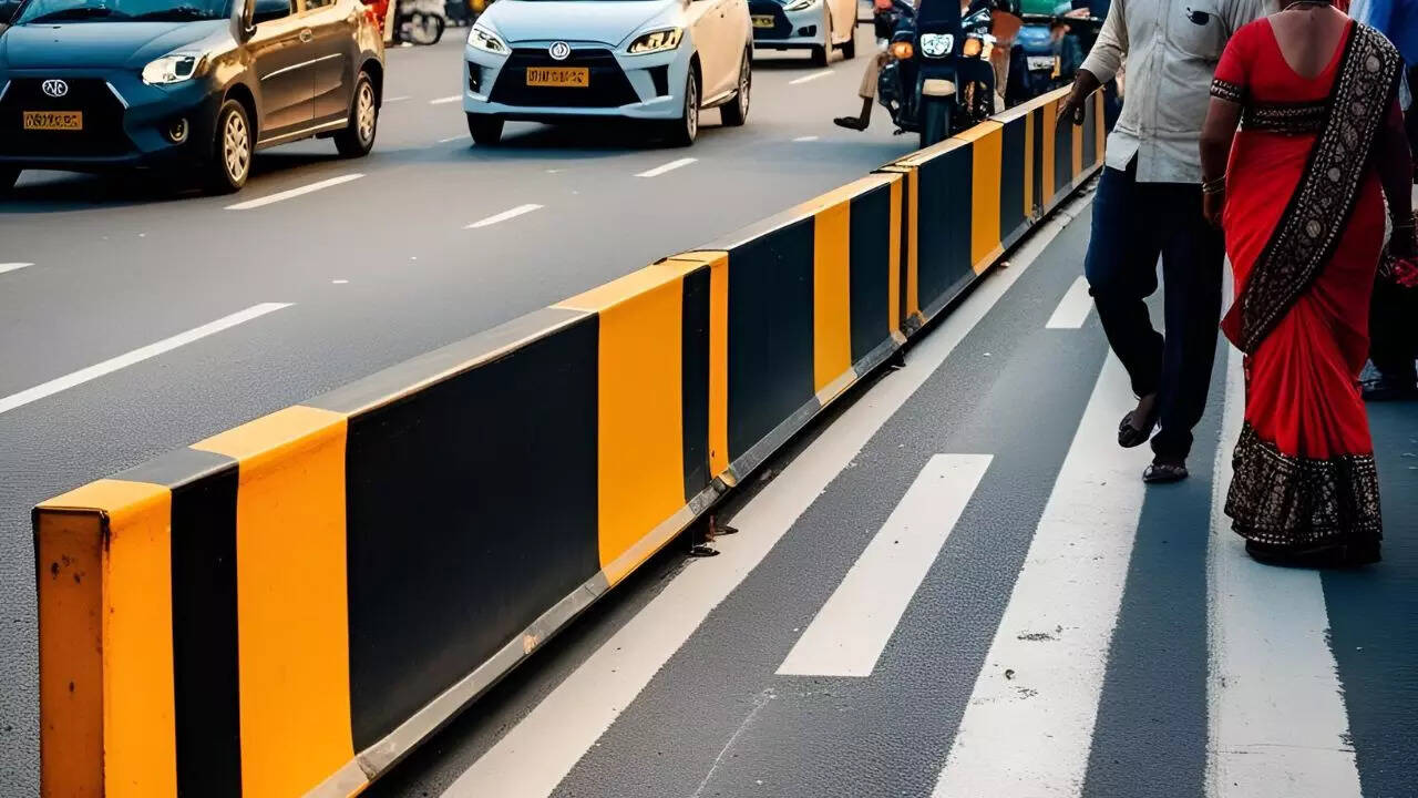 The real reason for black and yellow stripes on road dividers