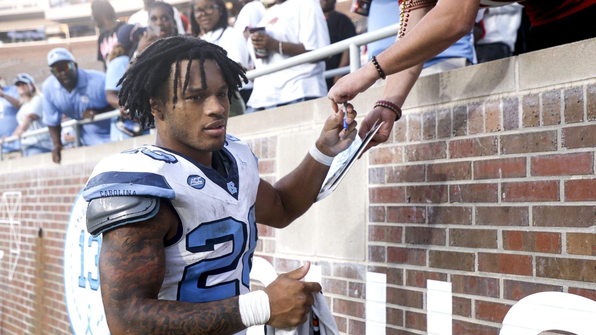 NFL Draft: Omarion Hampton selected No. 22 overall by the Los Angeles ...