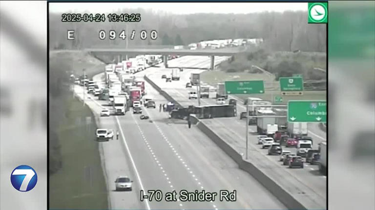 Semi crashes through barrier on I-70 causing hours-long closure