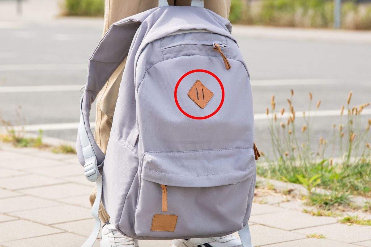 Here’s the Real Purpose Behind Those Diamond Patches on Backpacks