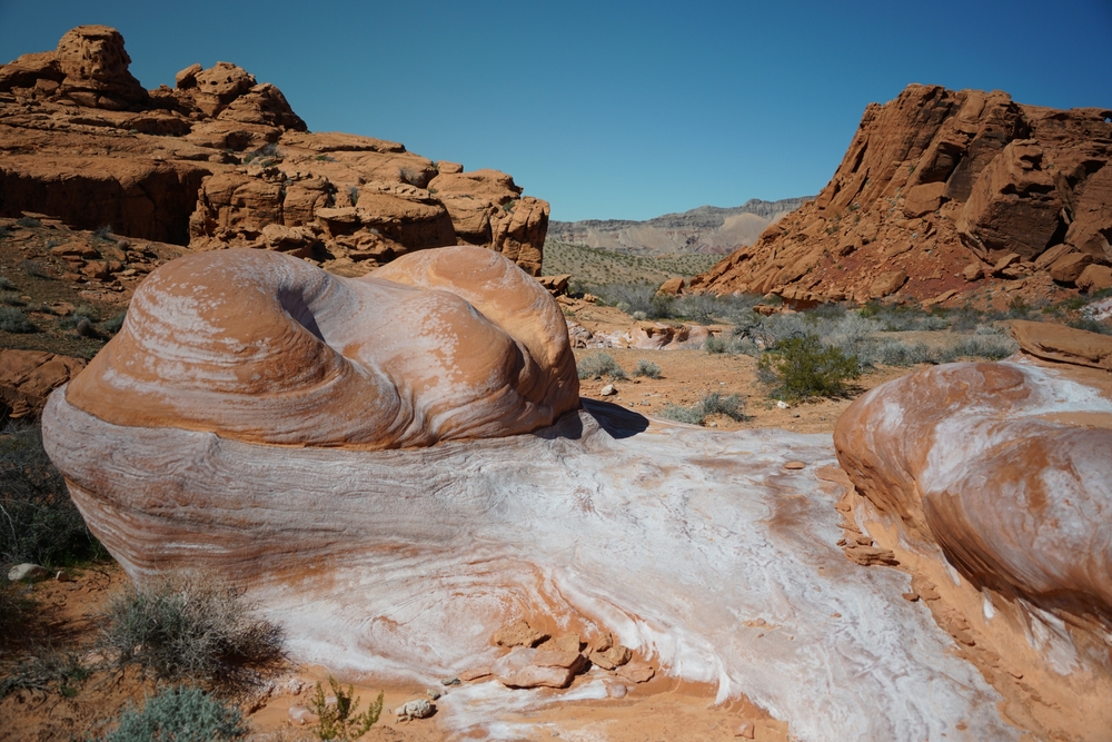 Blazing Red Sandstone & Ancient Rock Art Define Nevada’s Most Isolated ...