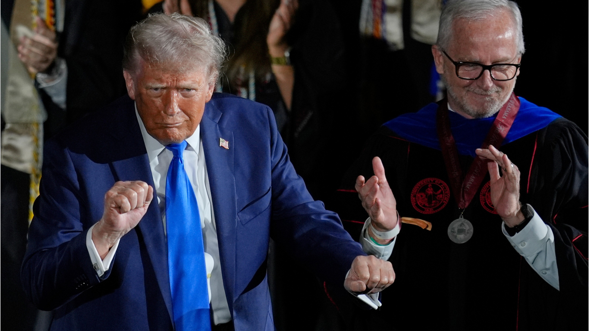 Donald Trump breaks out iconic dance at University of Alabama graduation