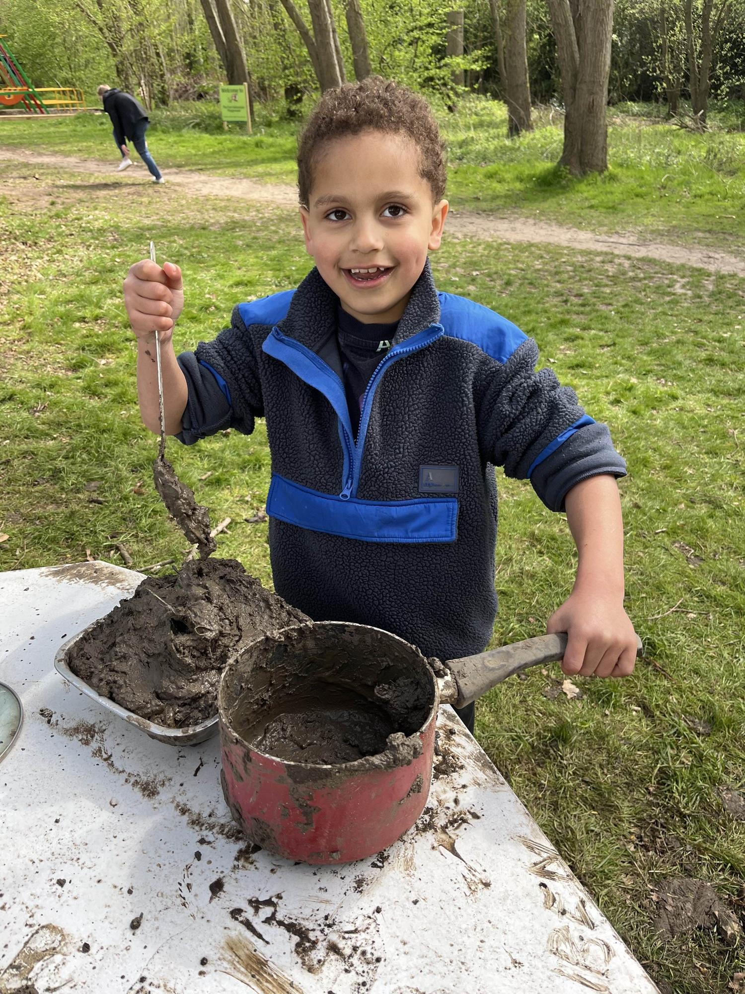 Winner Reuben, 6, makes a splat in first ever World Mud Pie Championships