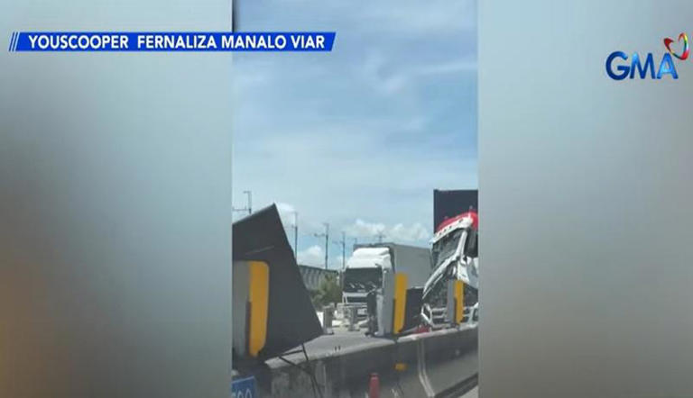 1 hurt after two trucks, van figure in SLEX collision