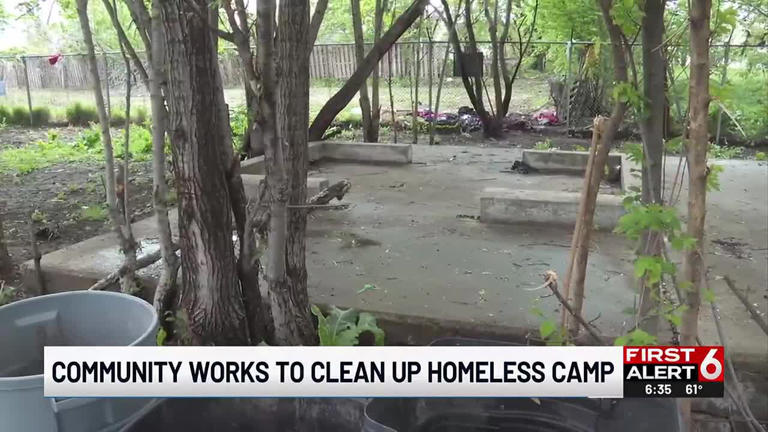 Father, son join in on helping clean up former site of Omaha homeless camp