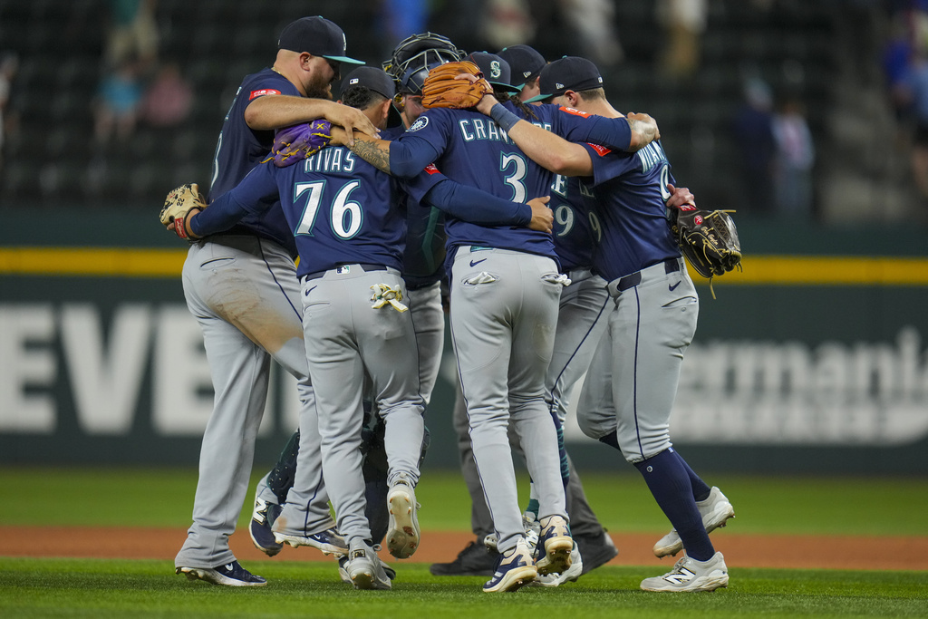 Raleigh conecta 2 jonrones y Marineros limitan a Rangers a 3 hits para apalearlos 13-1