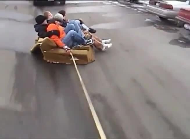 Couch Skitching Behind Truck