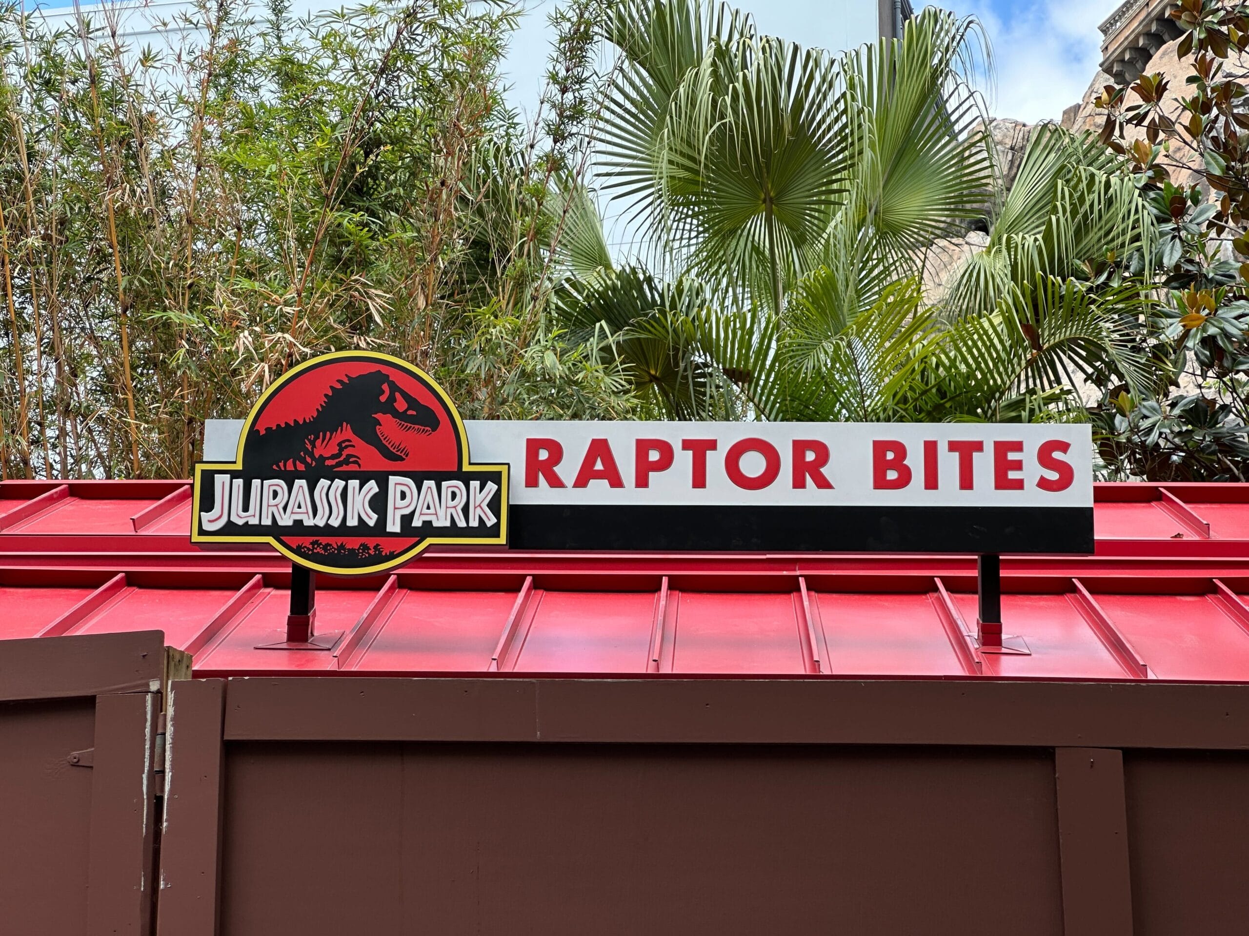 New Raptor Bites Kiosk Now Visible Behind Construction Walls at ...