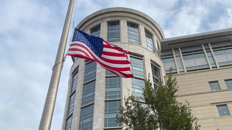 Why are flags at half-staff in Virginia?