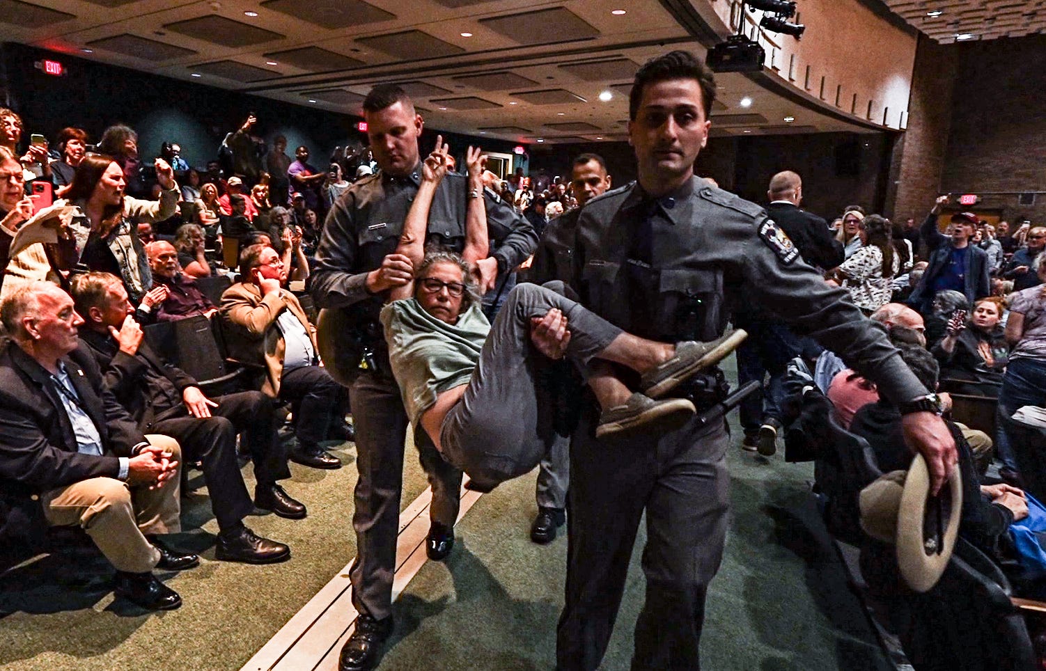 Video shows police carrying woman out of Mike Lawler town hall May 4 in ...