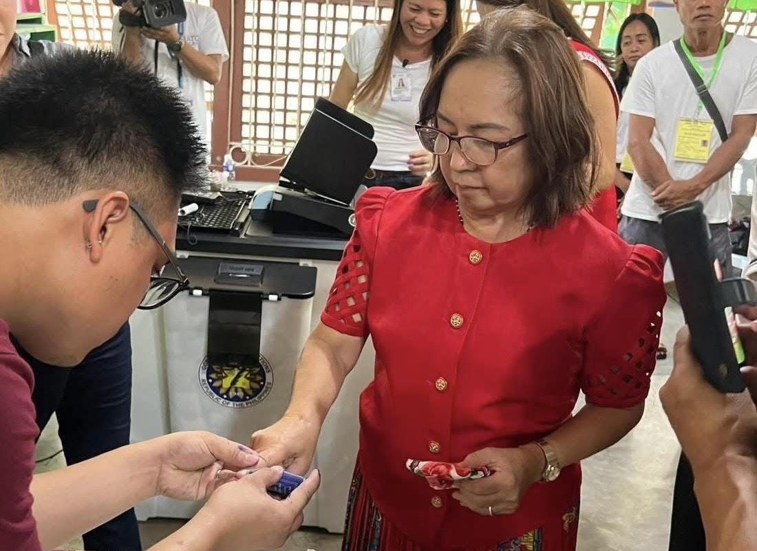 Gloria Arroyo, running unopposed, casts vote in Lubao