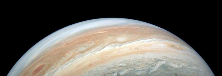 New Jupiter images reveal vast swirling clouds in striking detail