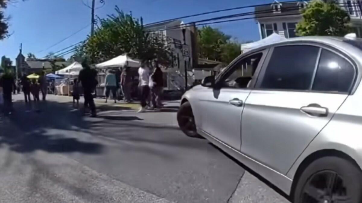 Woman Removes Police Barricade, Hits Cop Before Driving Through Street Fair