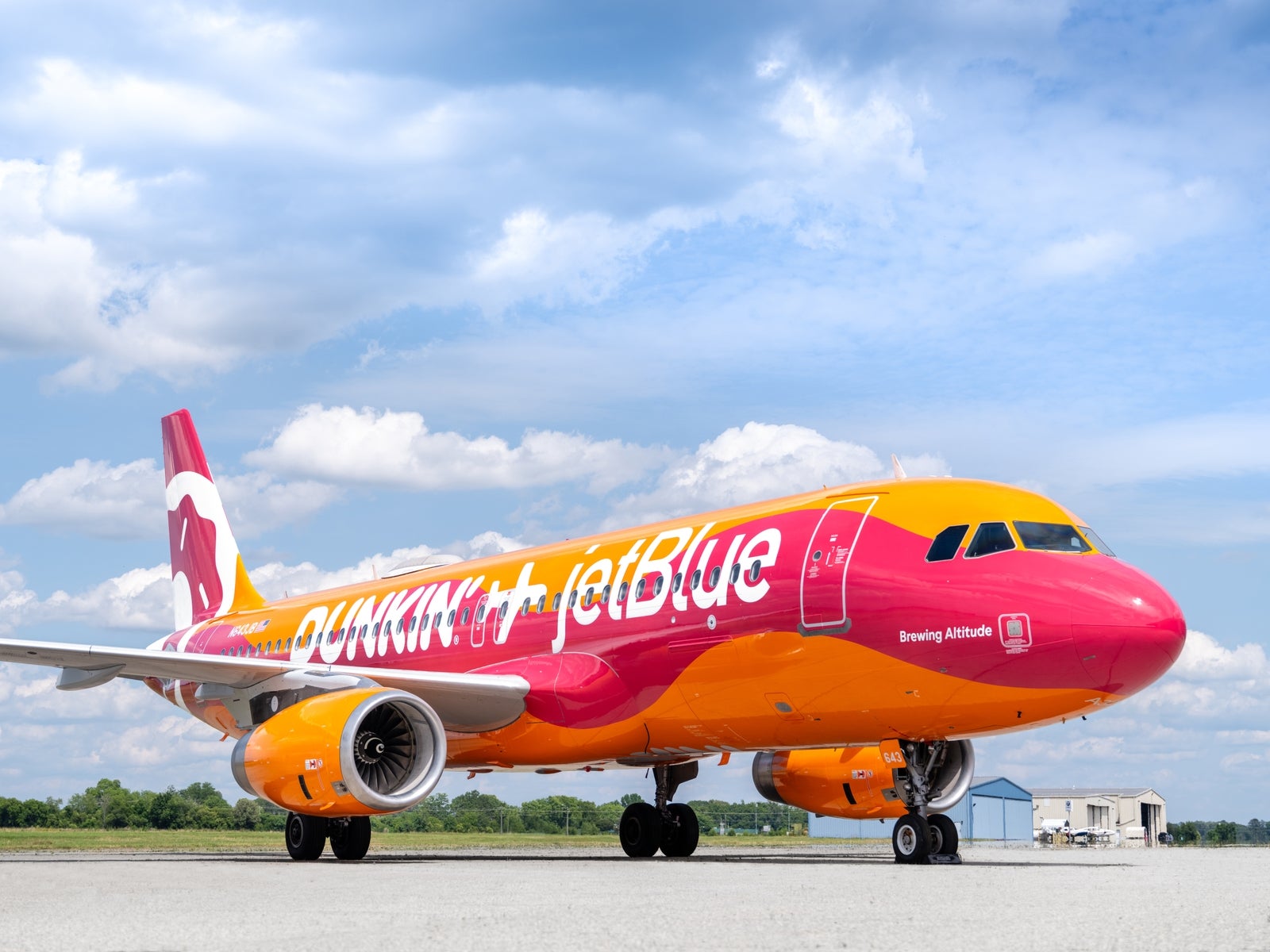 Here’s what to know about the new orange-and-pink JetBlue Dunkin’ plane