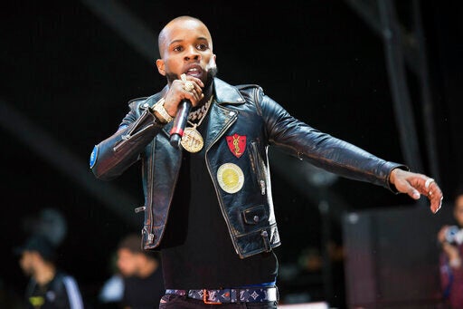 Rapper Tory Lanez ‘in good spirits’ after being stabbed 14 times in prison