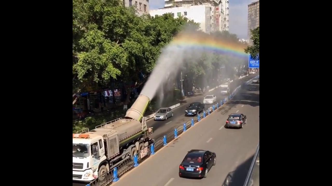 Showering Water That Creates Rainbow In The Road