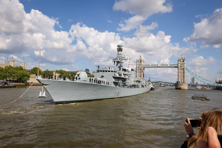 Submarine hunter warship makes striking entrance into central London