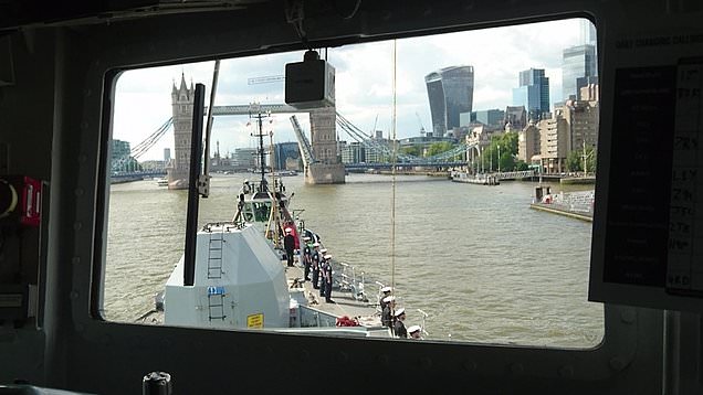 On board HMS Sutherland as it passes through Tower Bridge on its way to ...