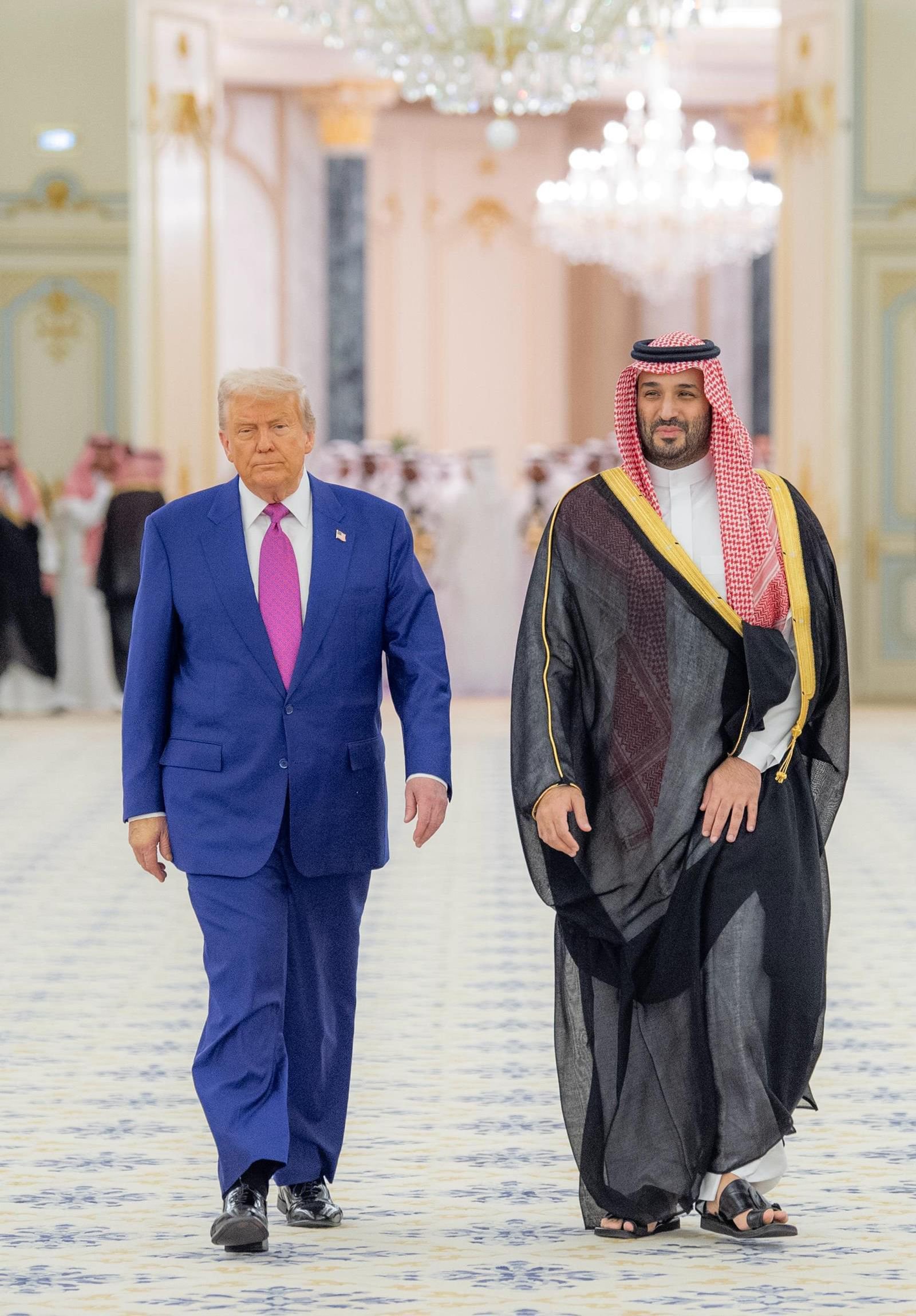 Donald Trump plays YMCA on stage while posing for photos with Mohammed bin Salman