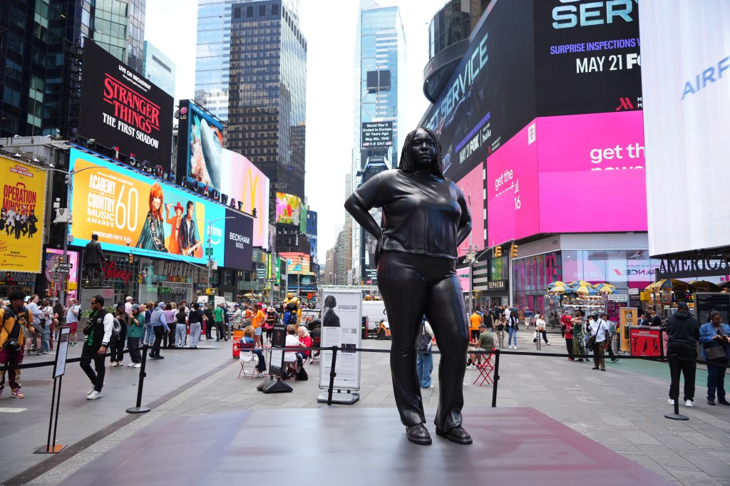‘Grounded In The Stars' Times Square Statue Sparks Social Media Debate