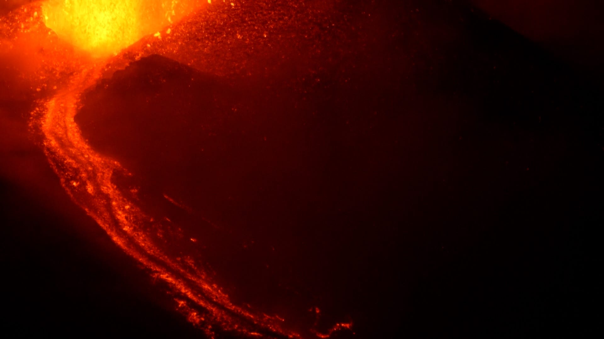 Watch Mount Etna erupt with glowing lava and ash clouds