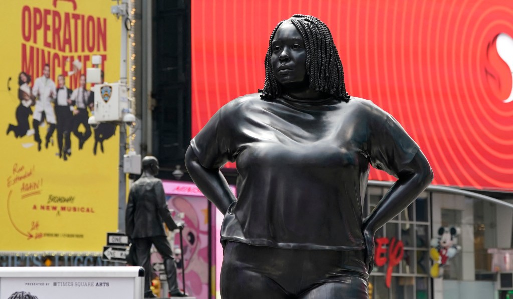 ‘Grounded In The Stars' Times Square Statue Sparks Social Media Debate