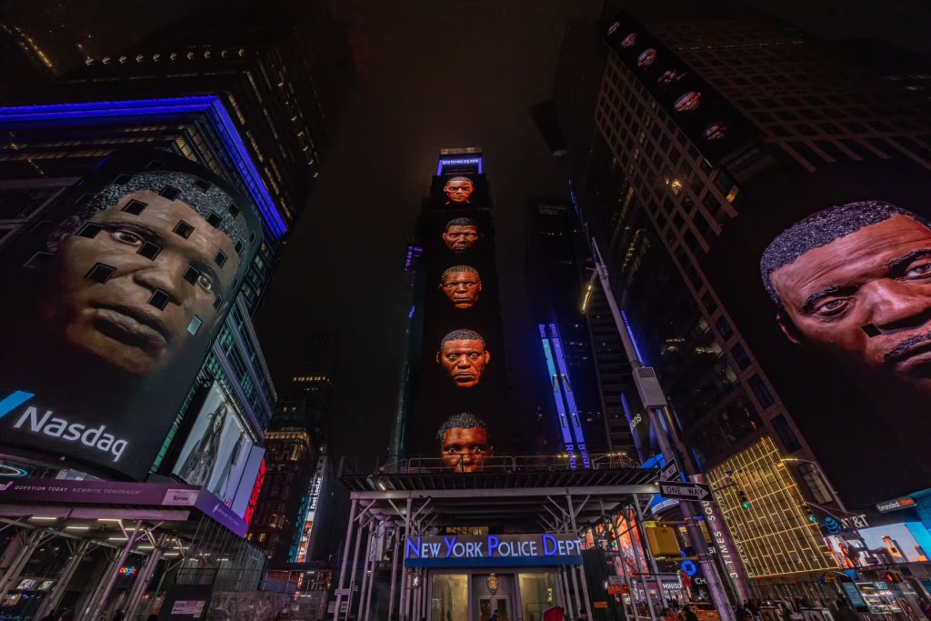 ‘Grounded In The Stars' Times Square Statue Sparks Social Media Debate