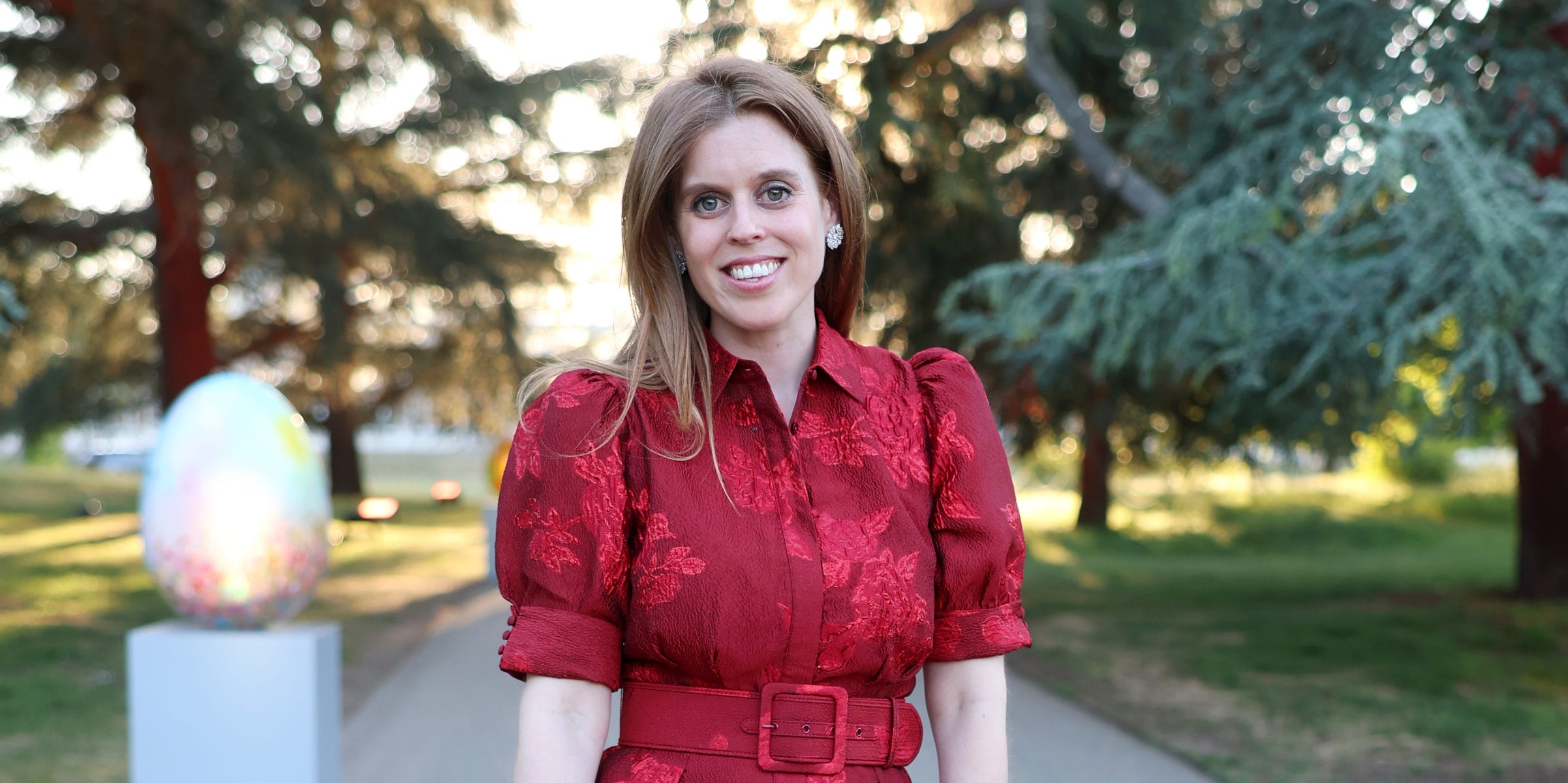 Princess Beatrice Steps Out Solo in Glamorous Red Floral Gown