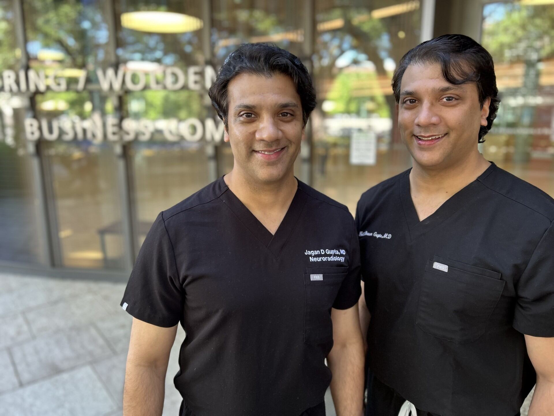 Identical twins earn fifth degrees from Tulane University