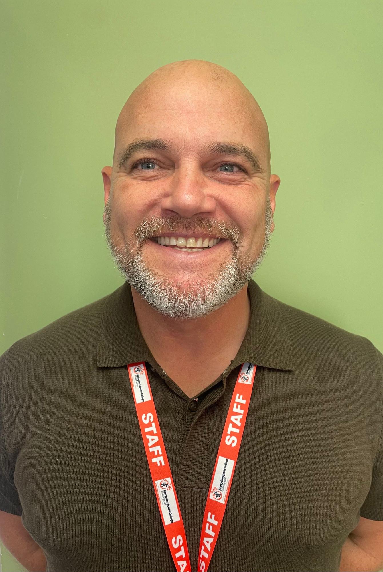 New executive headteacher says football management career helps him ...