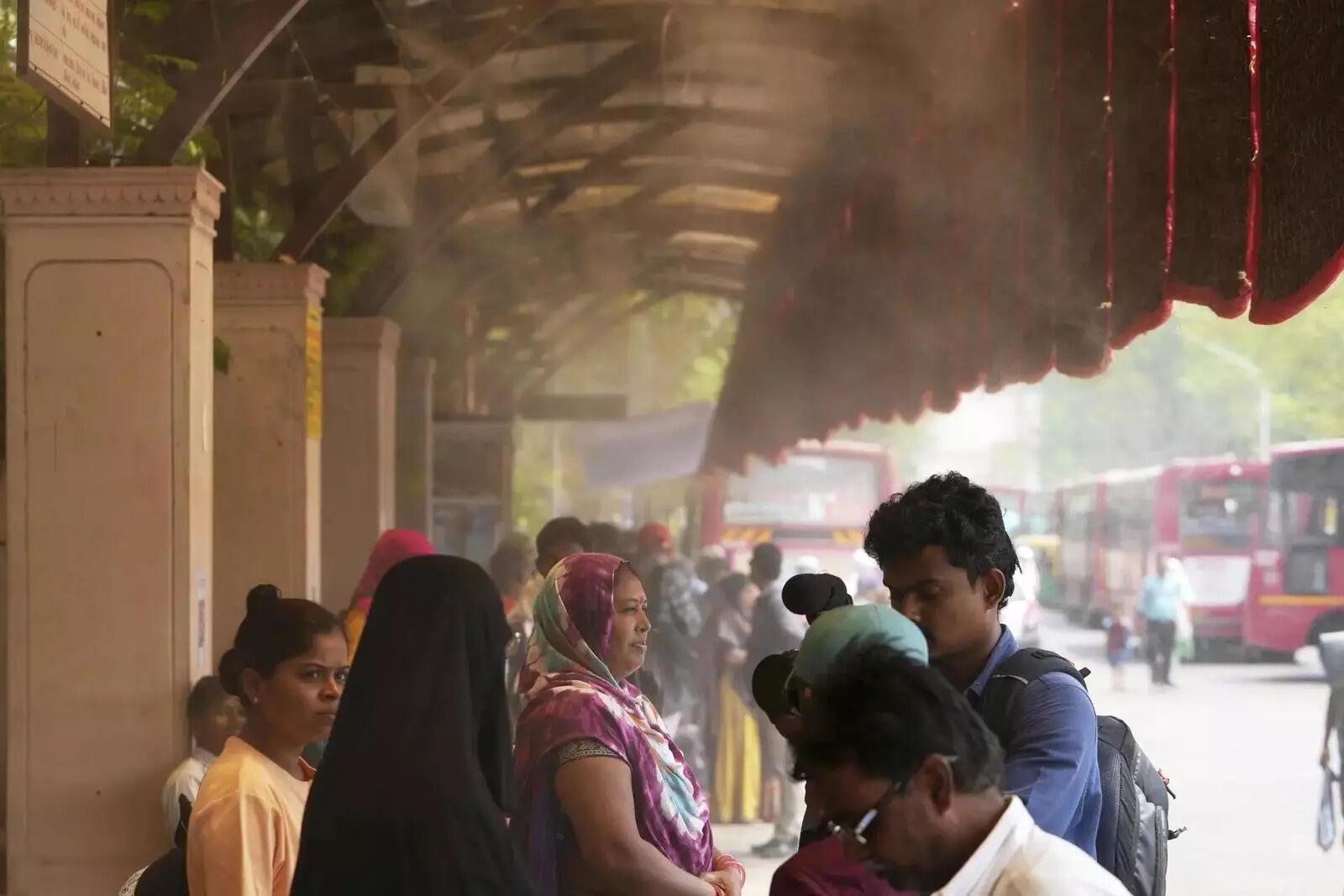 In heatwave-hit Ahmedabad, a cool bus stop with sprinklers offers rare ...