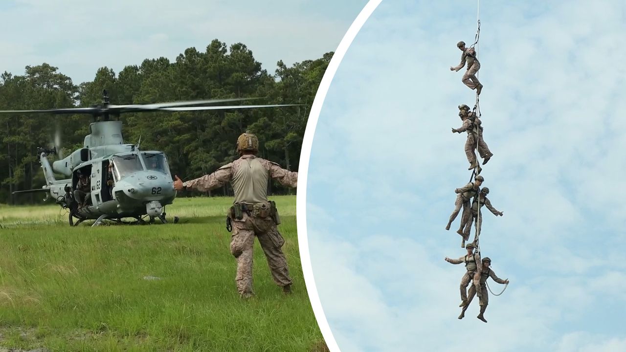 Seven US soldiers dangle from helicopter while being lifted into sky