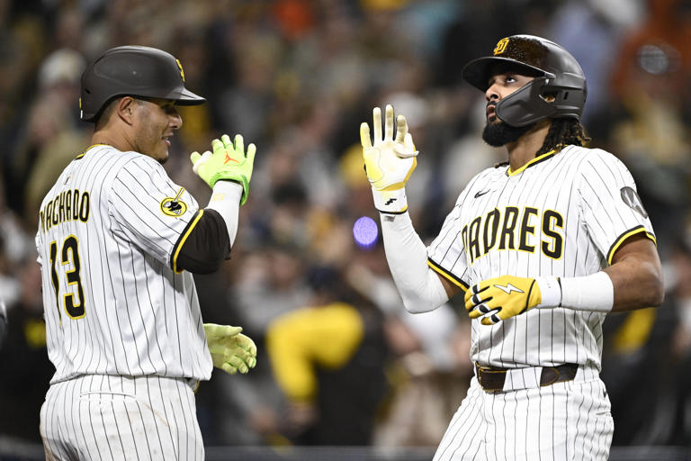 Fernando Tatis Jr. has one of smoothest bat flips of all-time on walk ...