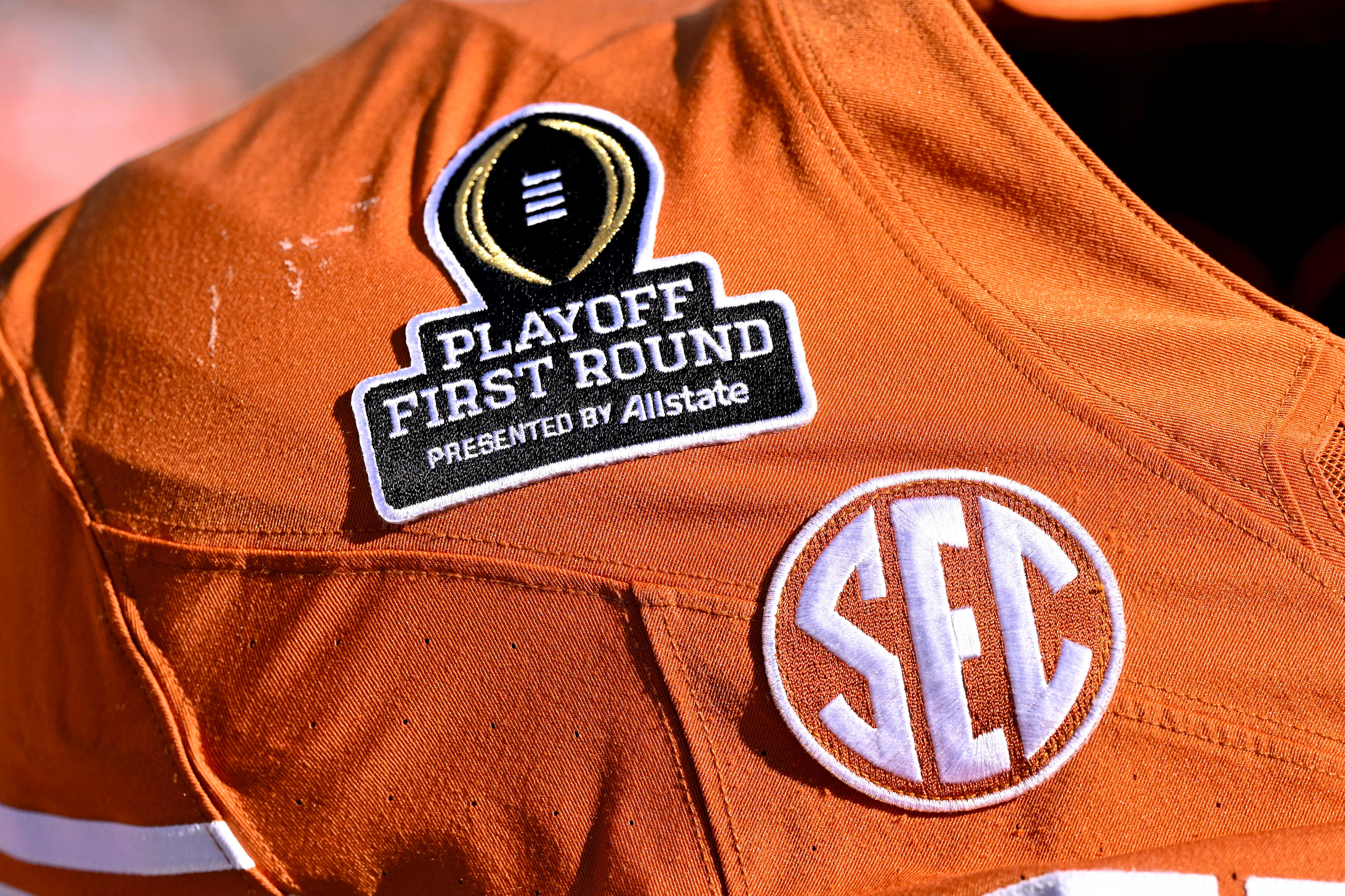 SEC draws fire over 16-team format as College Football Playoff power ...
