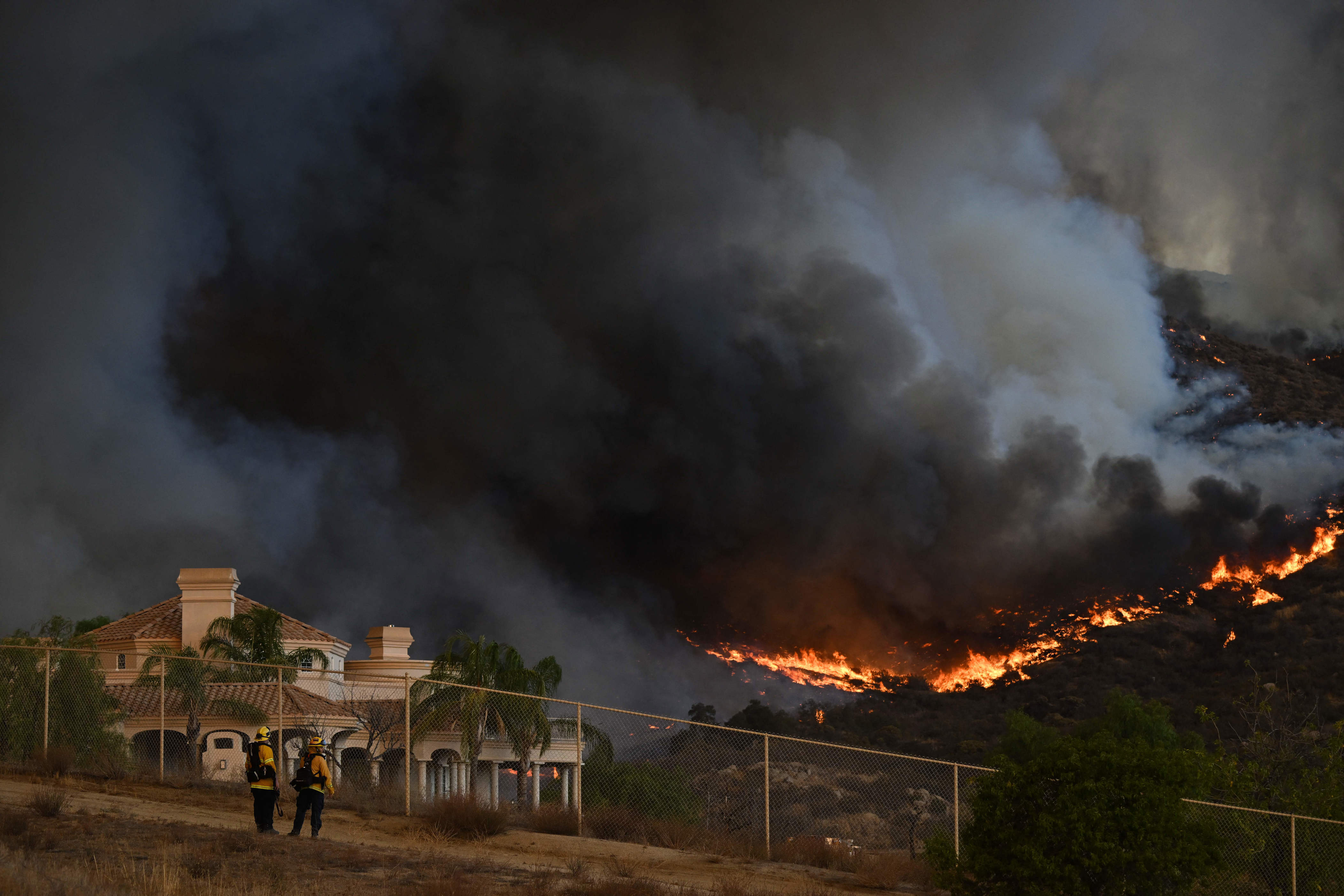 Wildfire smoke seeps into homes. Global protection would cost billions.