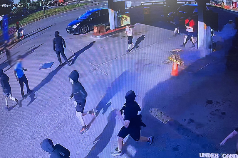 Rampaging masked thugs throw lit flare into Scots petrol station