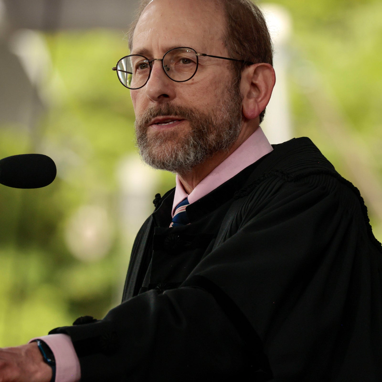 Harvard president takes pay cut amid Trump funding fight