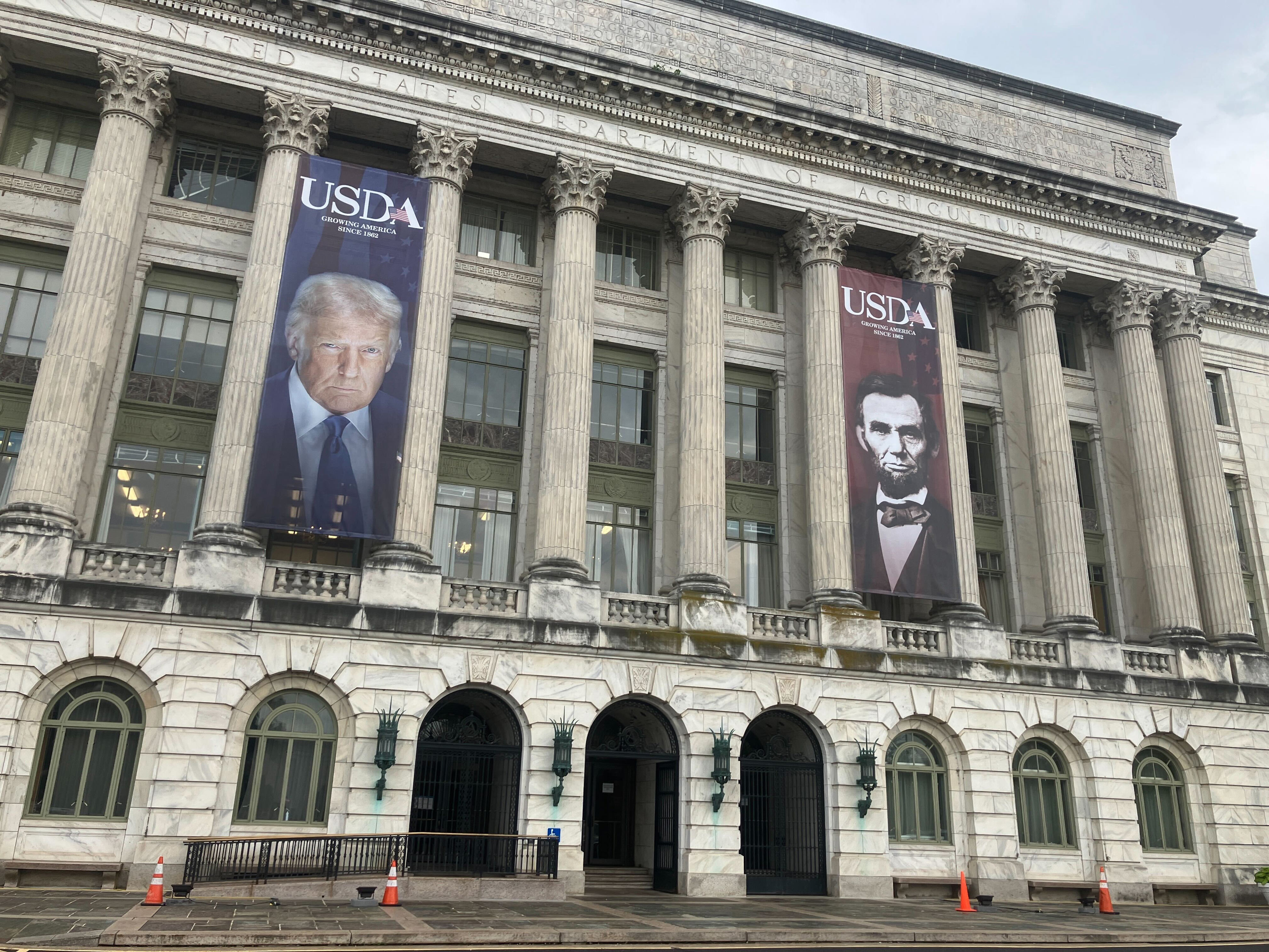 ‘Deeply creepy’: Enormous brooding banner of Trump now hangs next to ...