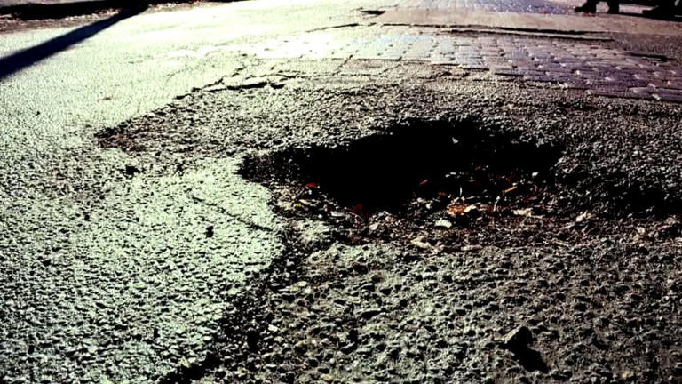 Massive potholes on northwest side of Indianapolis worry businesses ...
