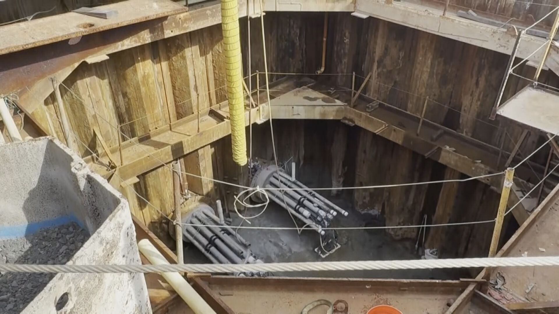 A peek under the plates at rail project’s underground work