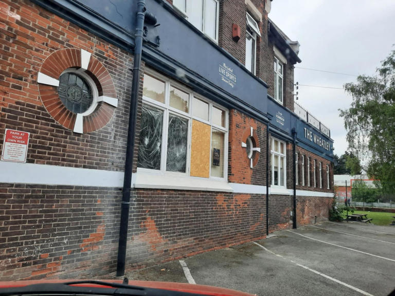 String of windows smashed by balaclava wearing yobs in attack on ...