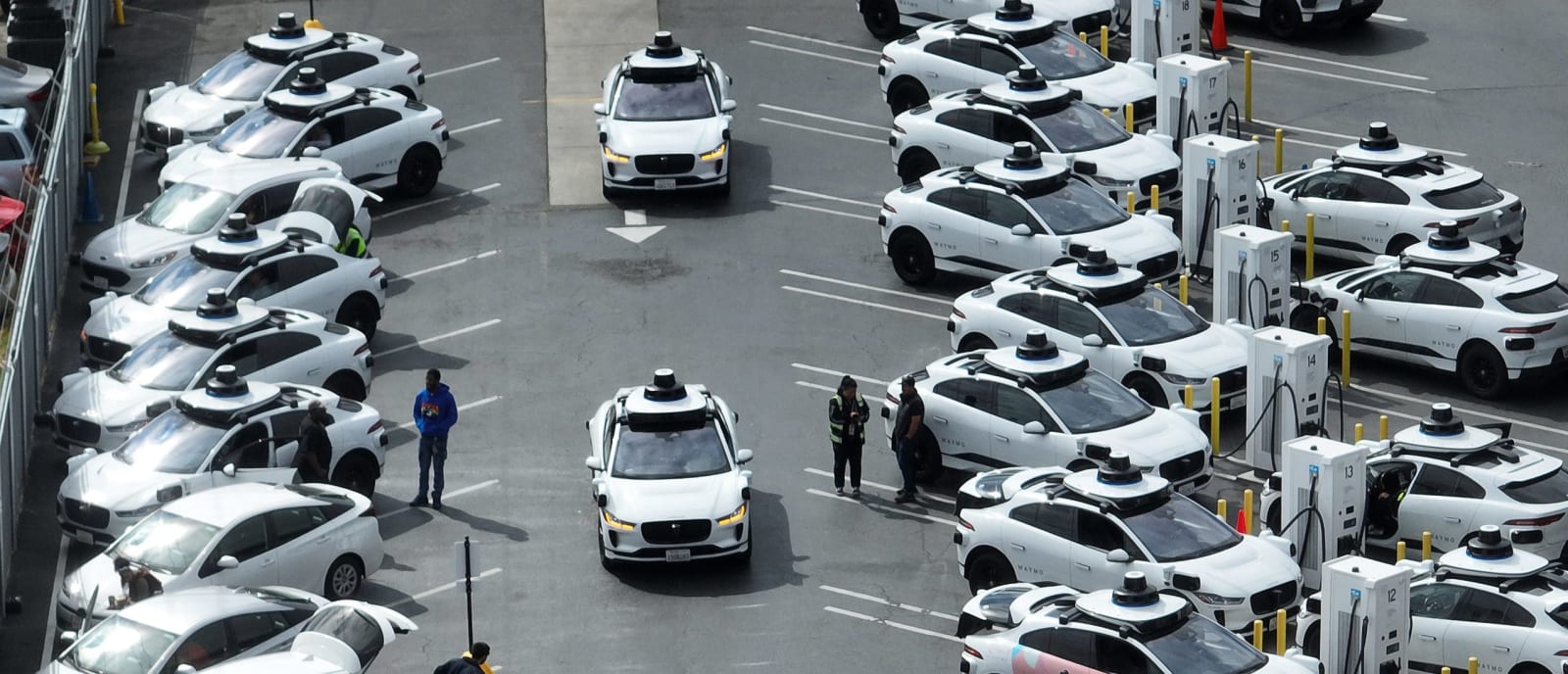 Waymo Recalls 1,200 Self-Driving Taxis After Collisions With Gates ...