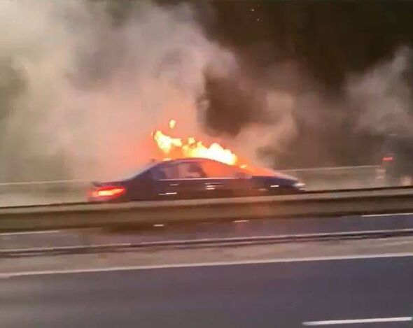 M60 fire as car bursts into flames shutting down motorway
