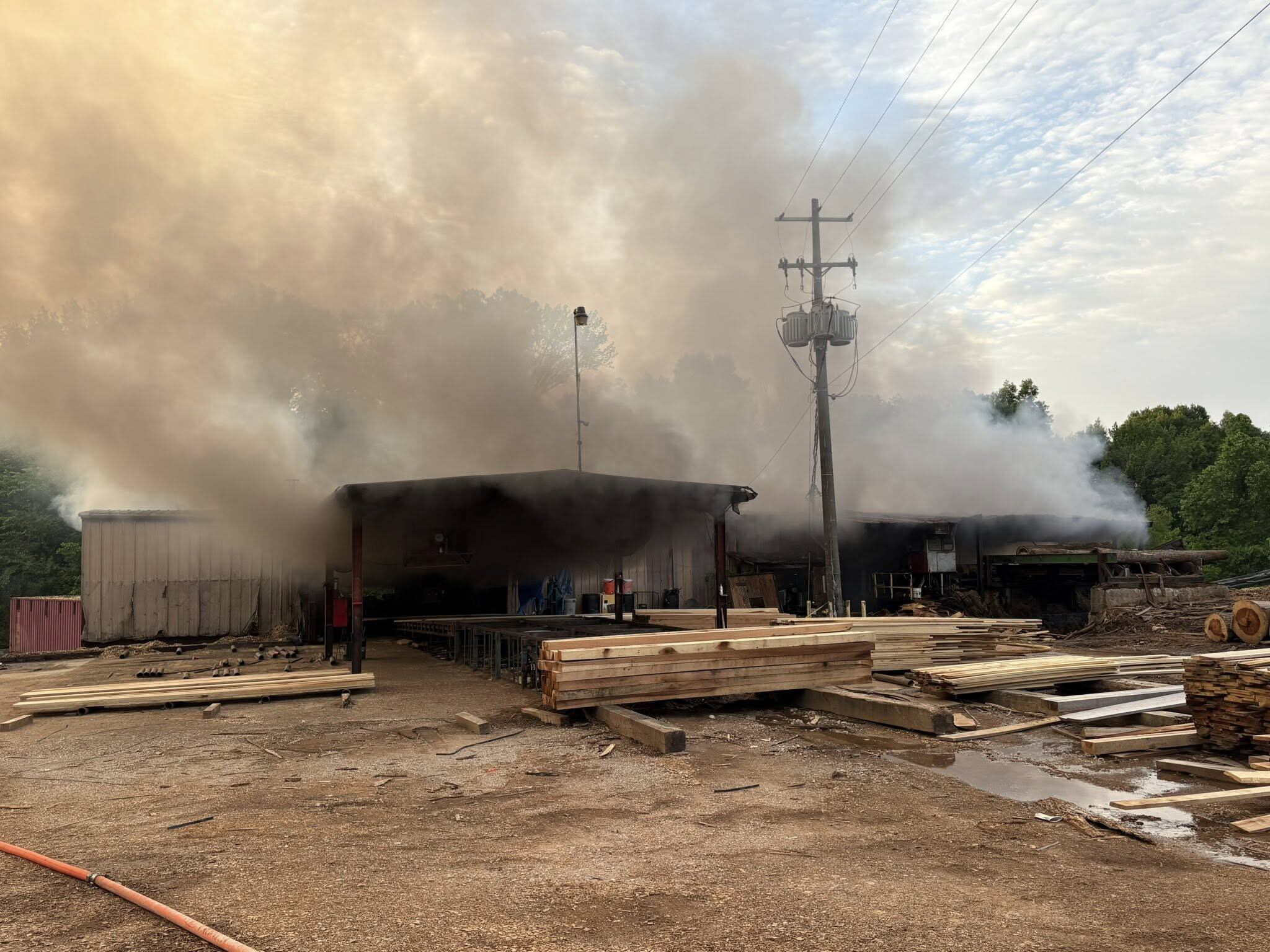 Crews battle structure fire at lumber company in Rogersville