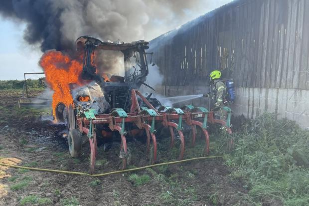Firefighters save barn as tractor bursts into flames in Cornwall